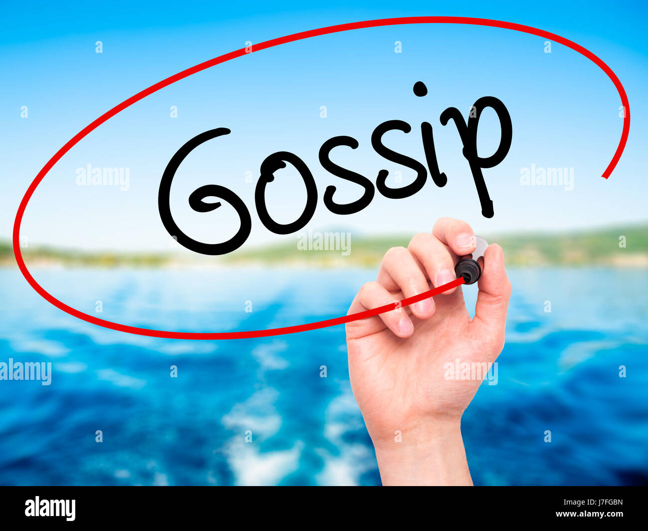 Man Hand writing Gossip with black marker on visual screen. Isolated on ...