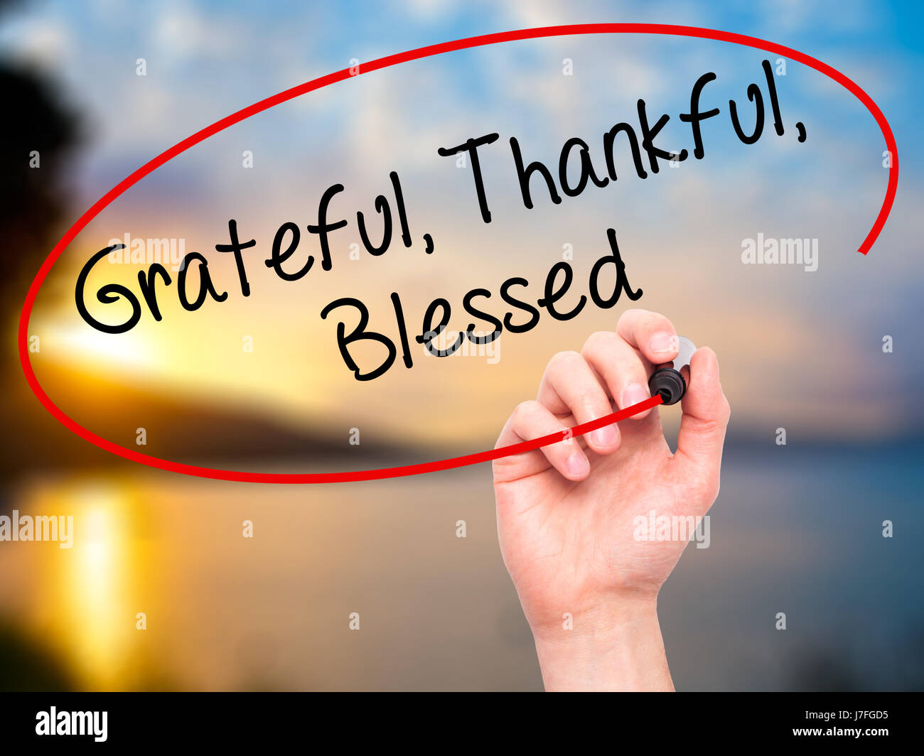 Man Hand writing Grateful Thankful Blessed with black marker on visual ...