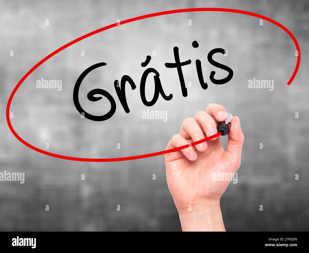 Man Hand writing Gratis with black marker on visual screen. Isolated on ...