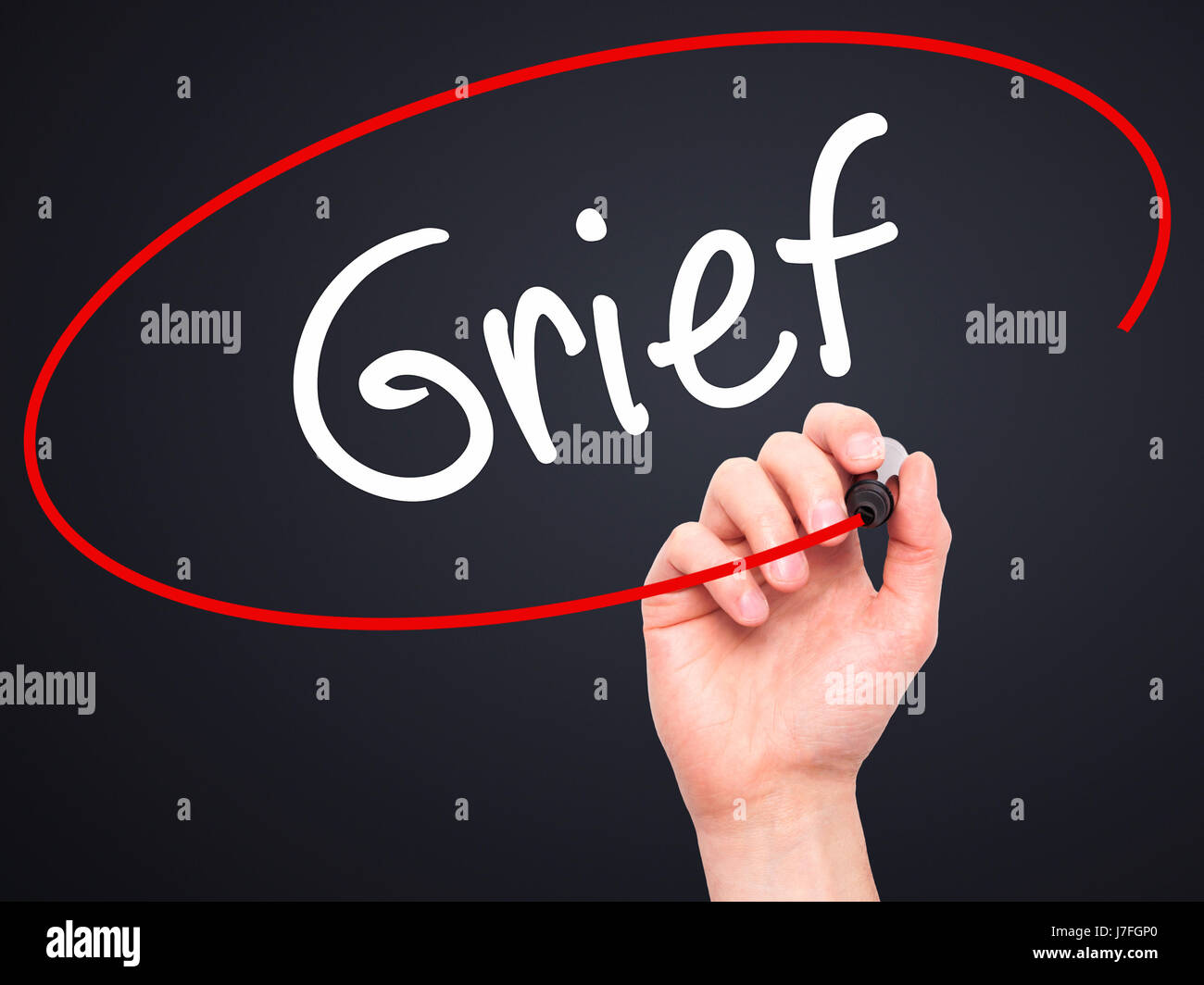Man Hand writing Grief with black marker on visual screen. Isolated on ...