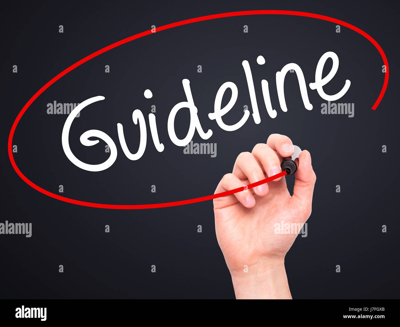 Man Hand writing Guideline with black marker on visual screen. Isolated ...