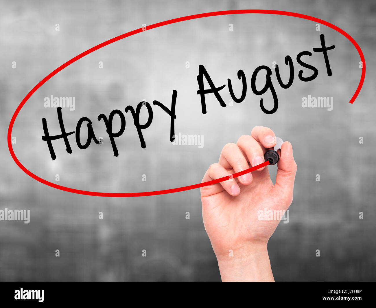 Man Hand writing Happy August with black marker on visual screen ...