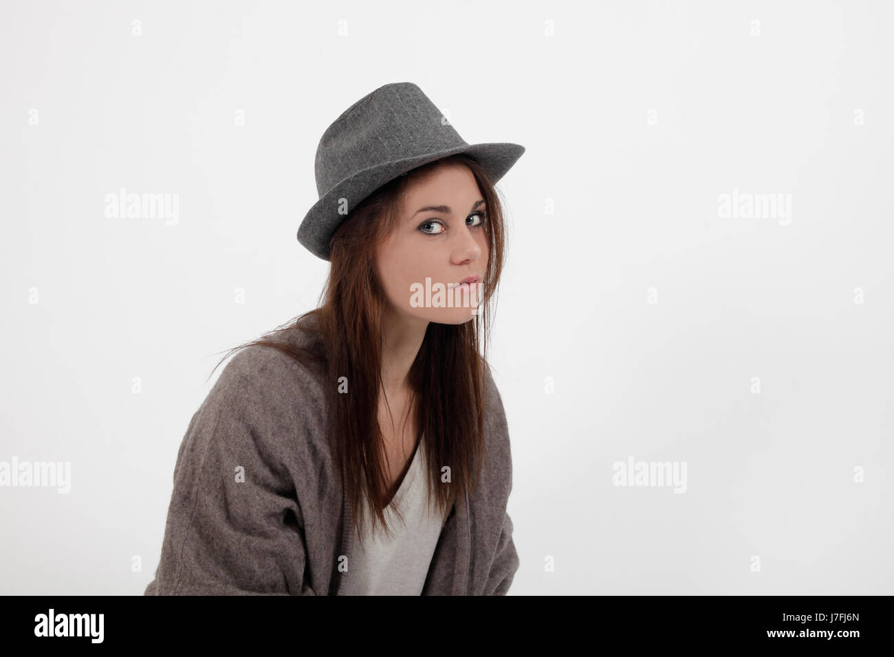 hat portrait look glancing see view looking peeking looking at girl ...