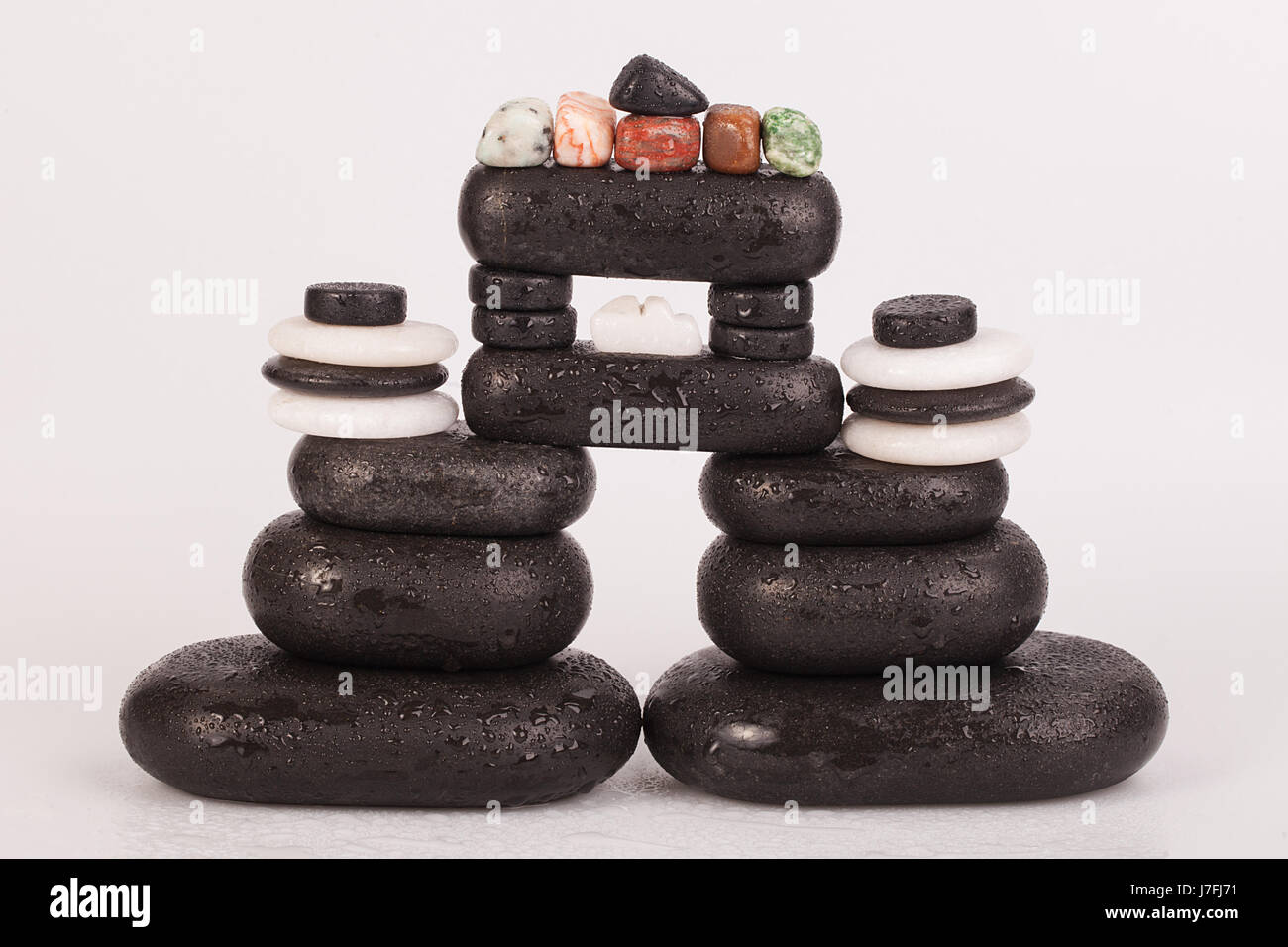 Row Of Chakra Crystals - seven chakra colored crystals lined up in a ...