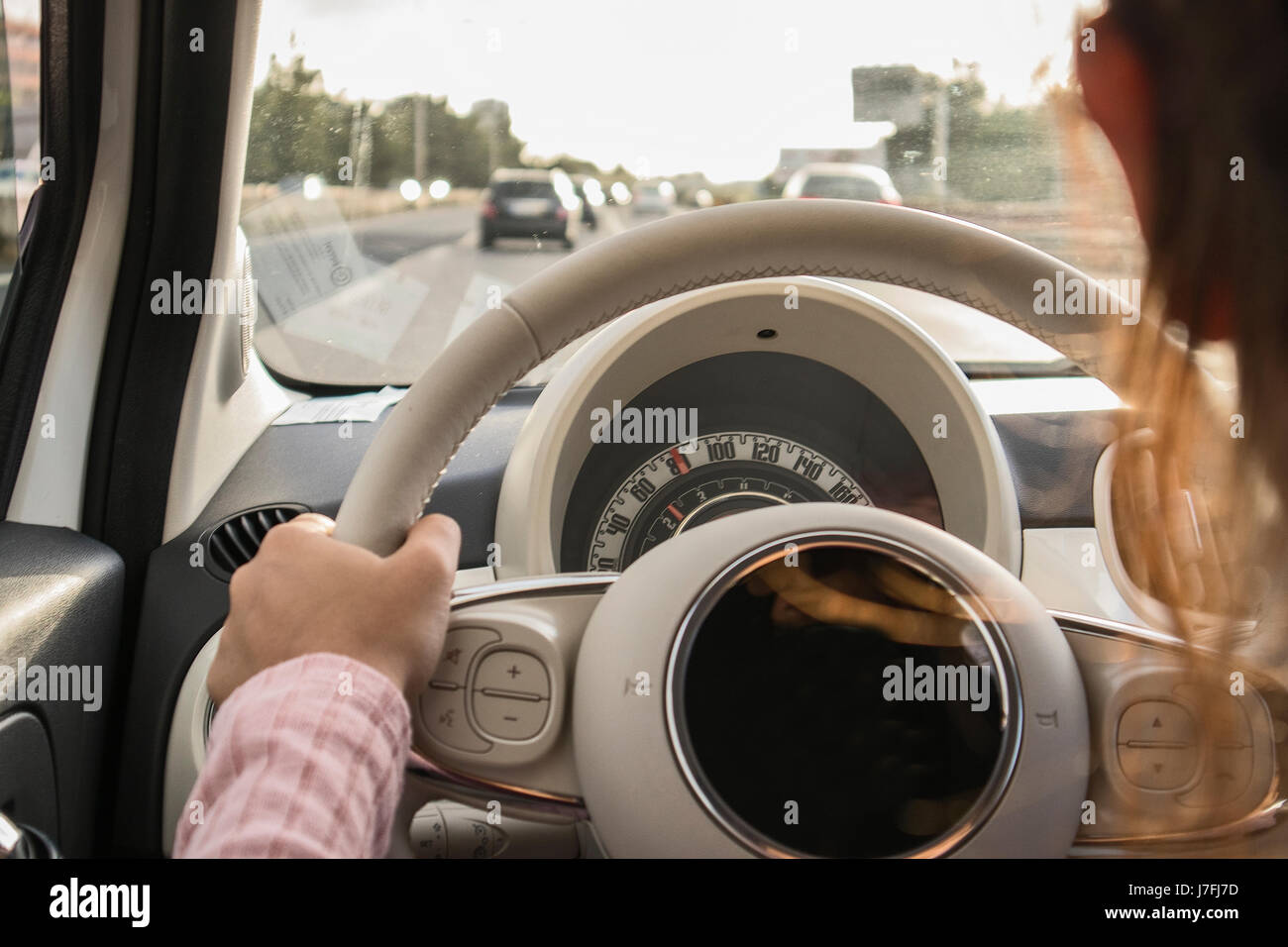 Girl driving on the highway Stock Photo - Alamy