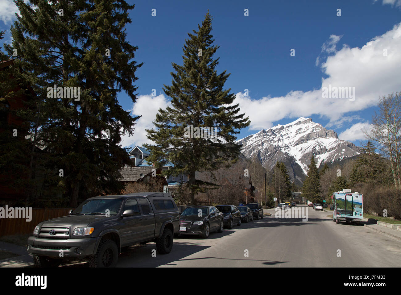 Parking on a street under Cascade Mountain in Banff, Alberta, Canada ...