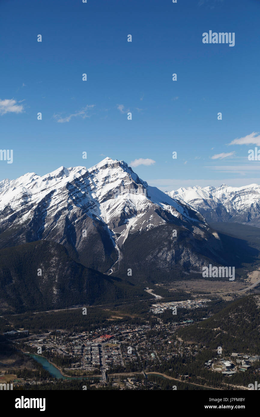 Cascade Mountain towers over Banff, Alberta, Canada.The mountain and ...