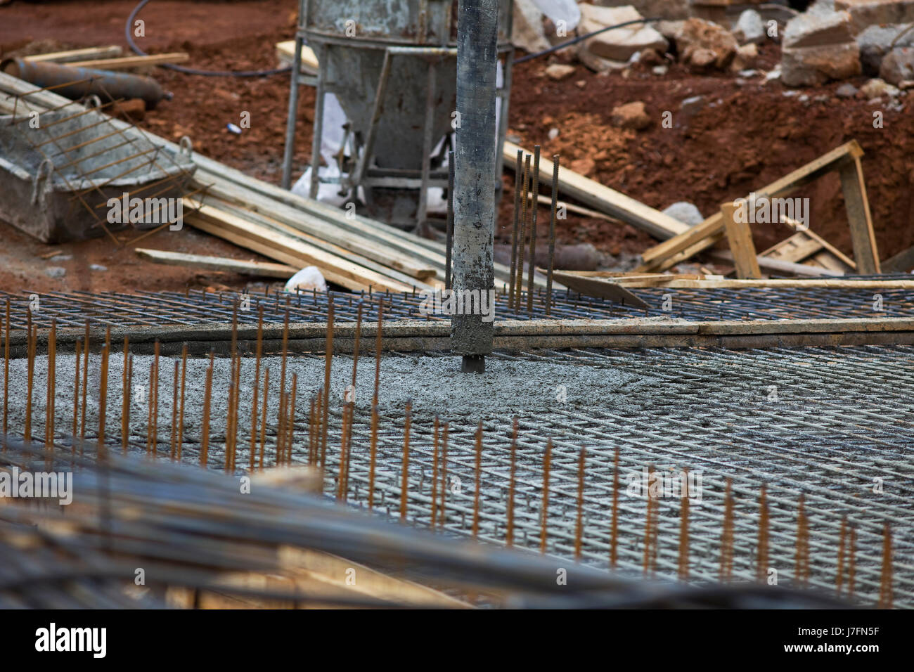 elevator lift flow rough concrete wall gravel steel wet action messy ...