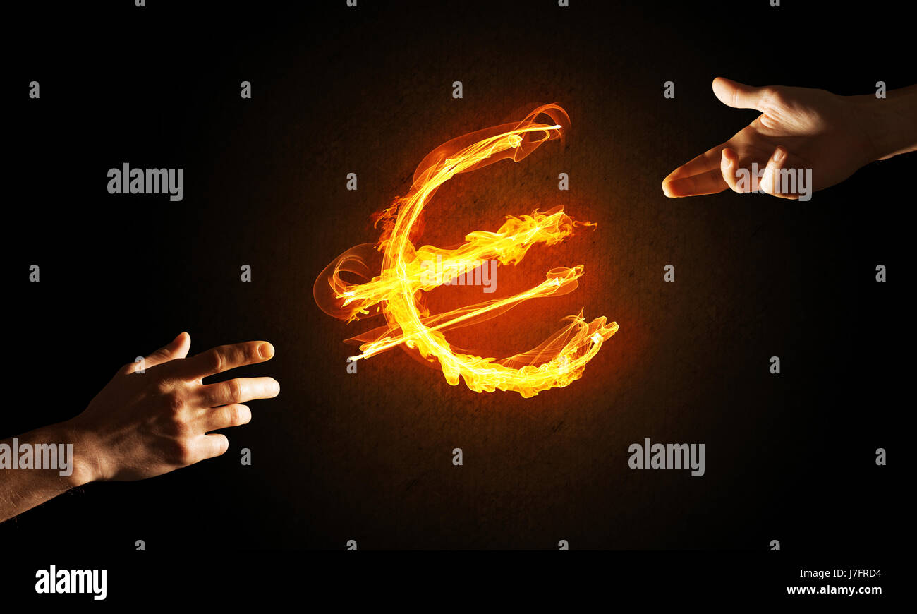 Concept of money making with euro currency fire symbol on dark ...