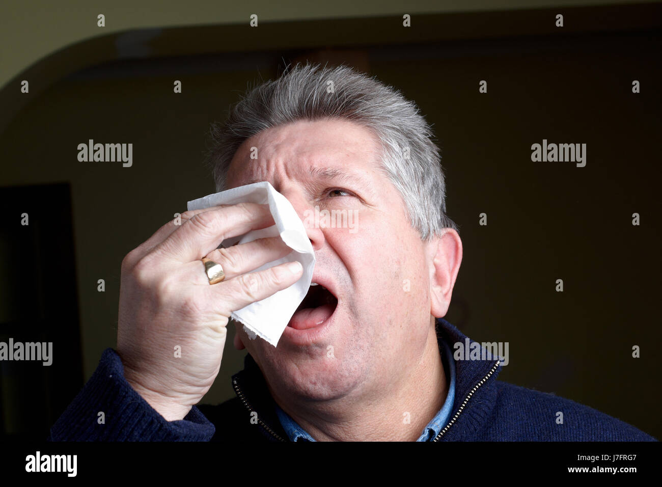 male masculine sneeze sneezing cold catarrh daytime tissue unwell flu ...