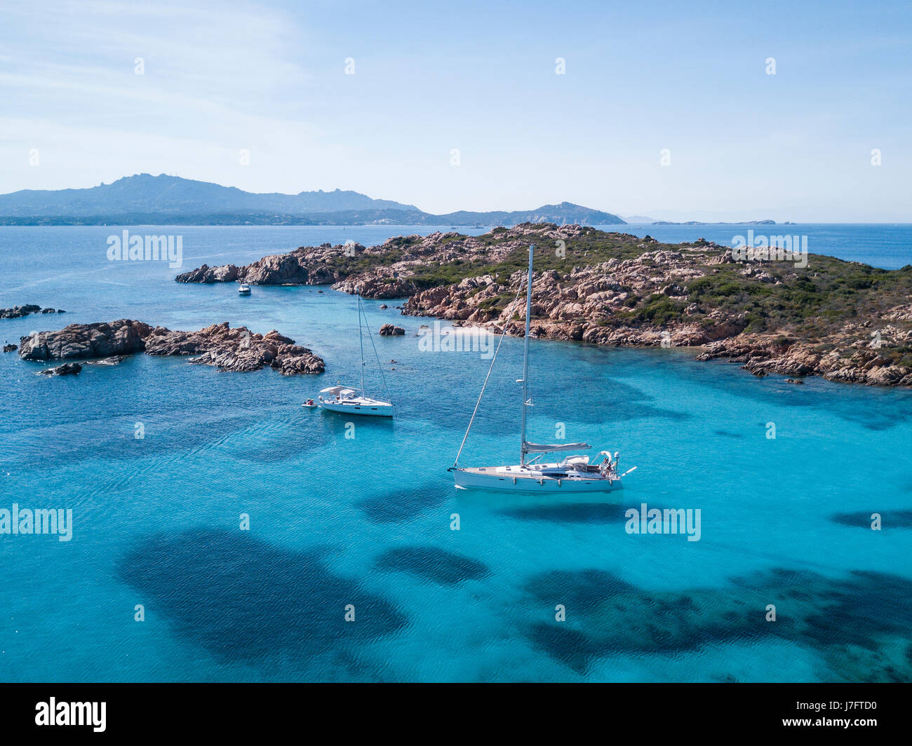 Aerial view of a boat in front of the Mortorio island in Sardinia ...