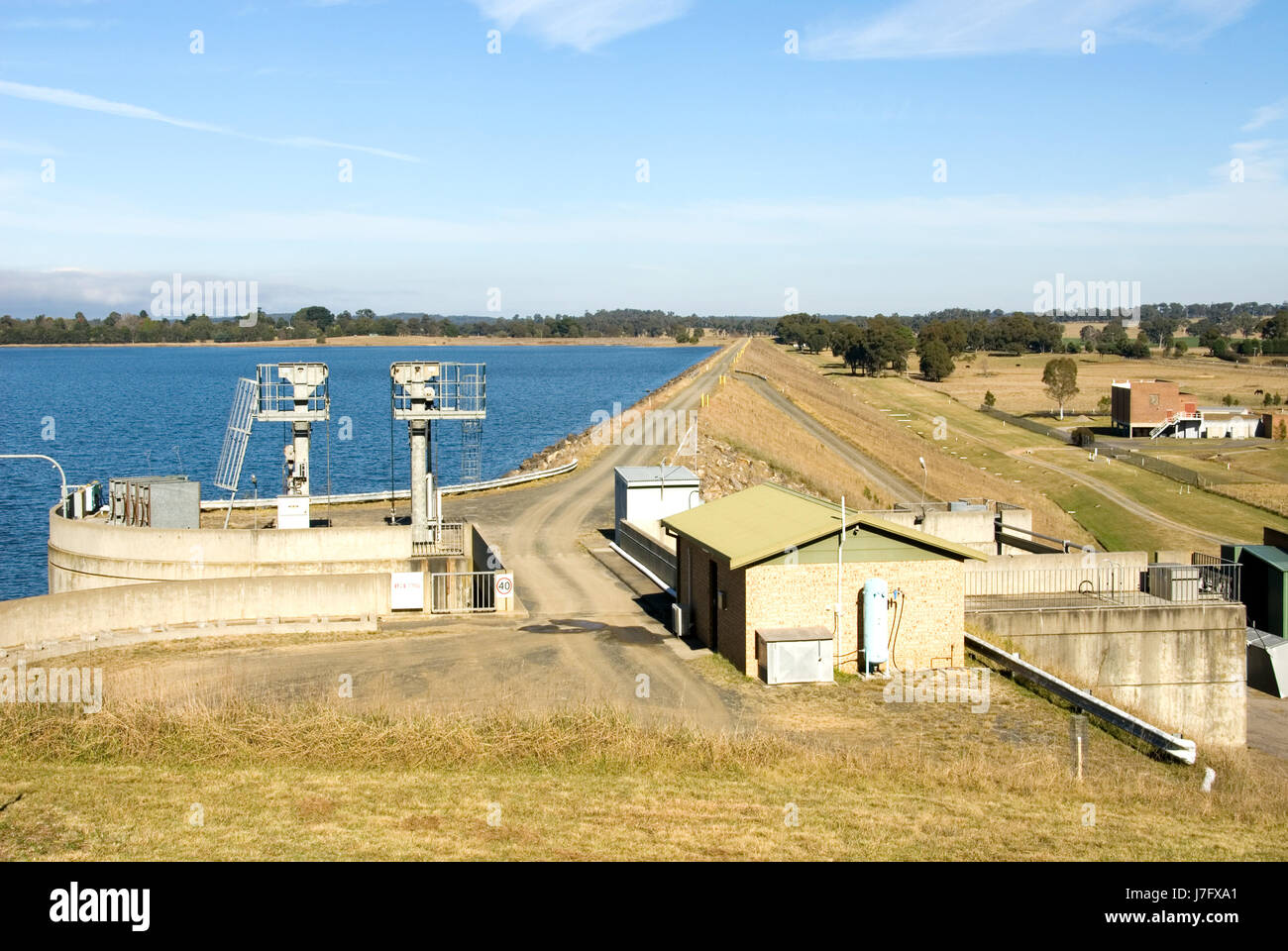 blue buildings tree trees australia concrete wall dam barrier ...