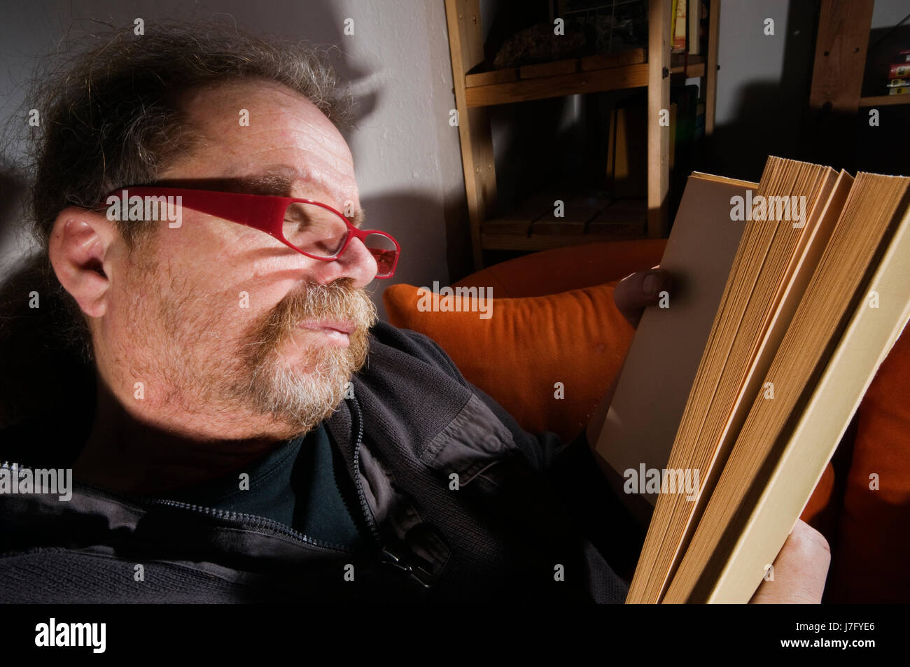 at home full beard scanning reads man senior senior citizen elderly ...