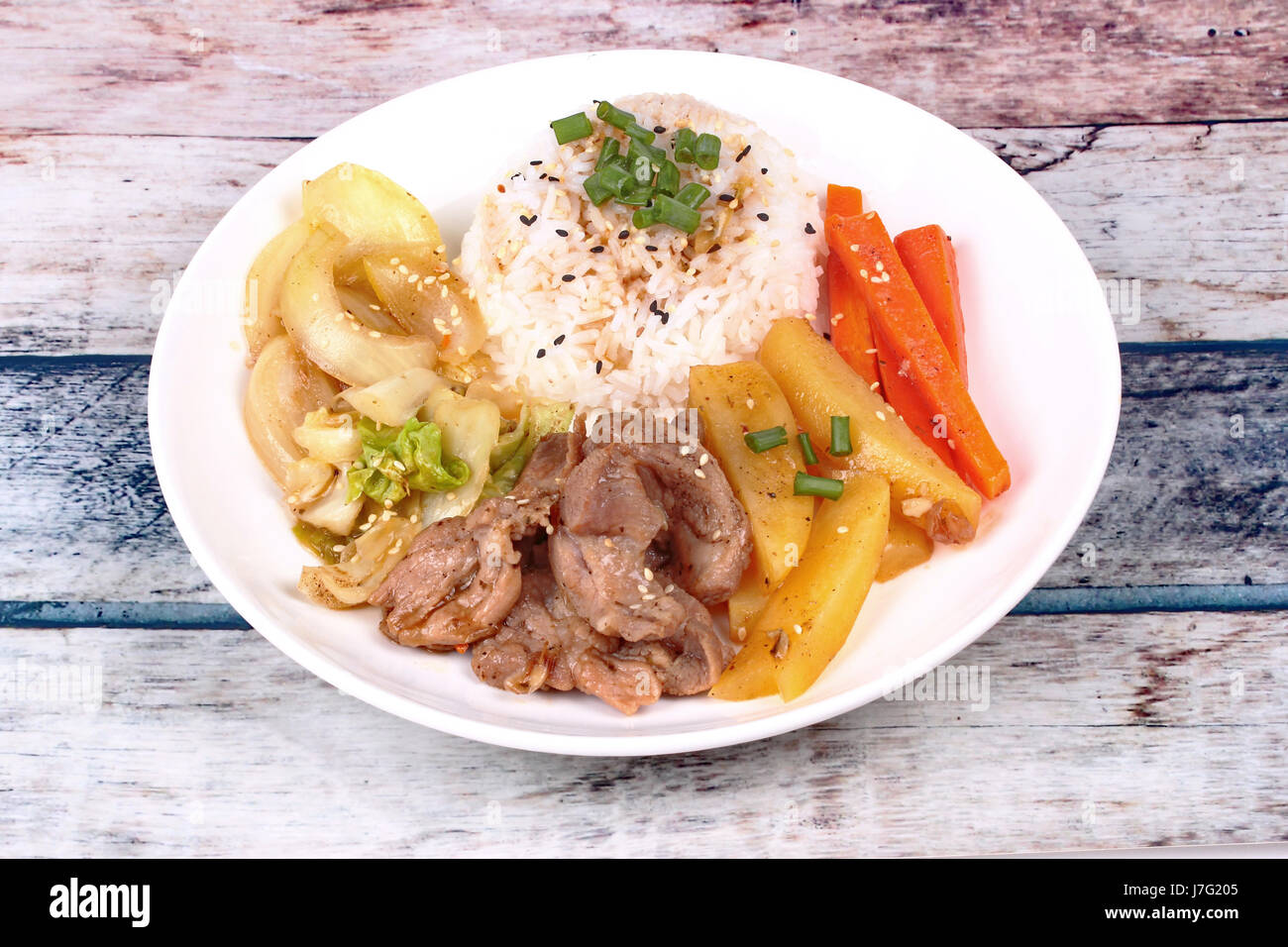 Thai jasmine rice in American Korean style, Rice with sliced pork steak ...