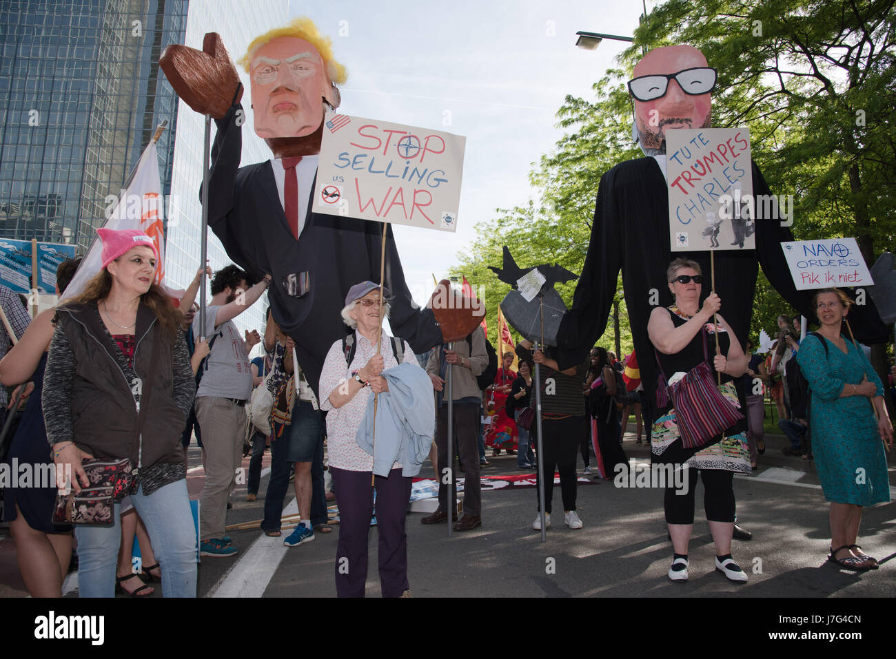 Protesters with anti Trump banners shout slogans at the march against ...