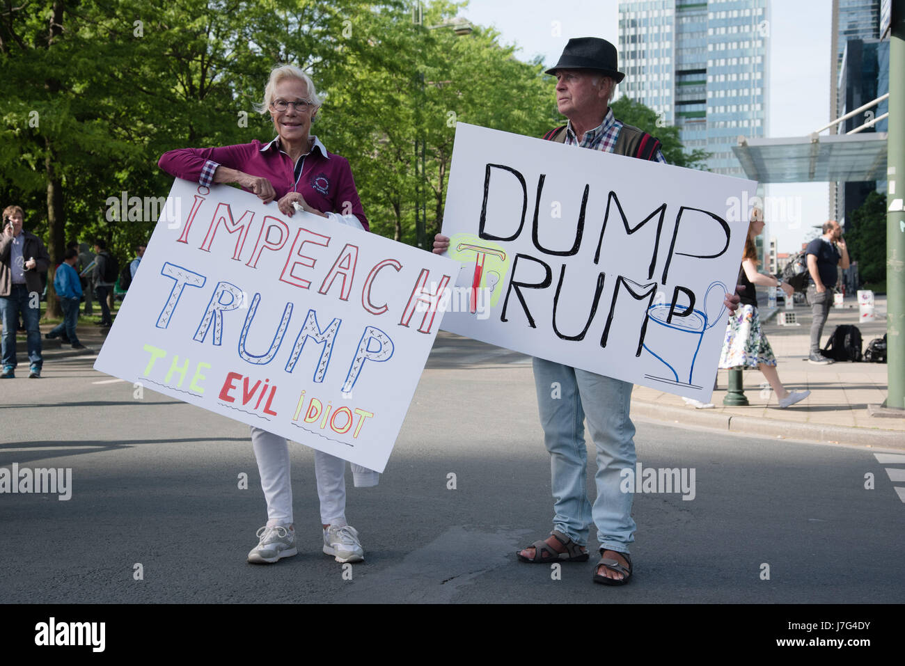 Protesters with anti Trump banners shout slogans at the march against ...