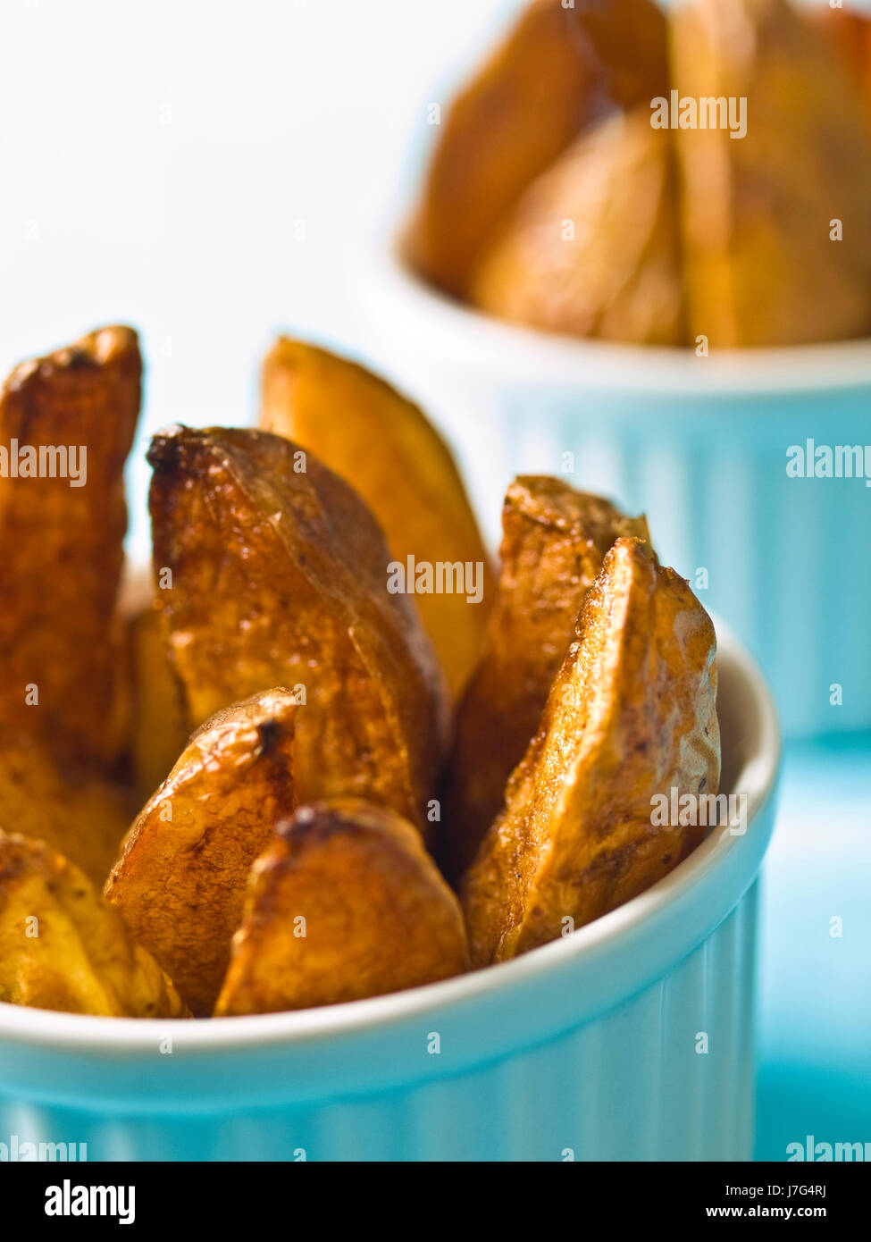 greasy deep unhealthy potato fried wedges thick wide fat snack potatoe ...