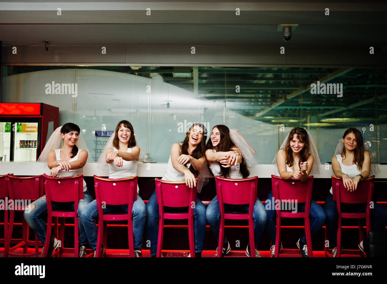 Girls on stools hi-res stock photography and images - Alamy