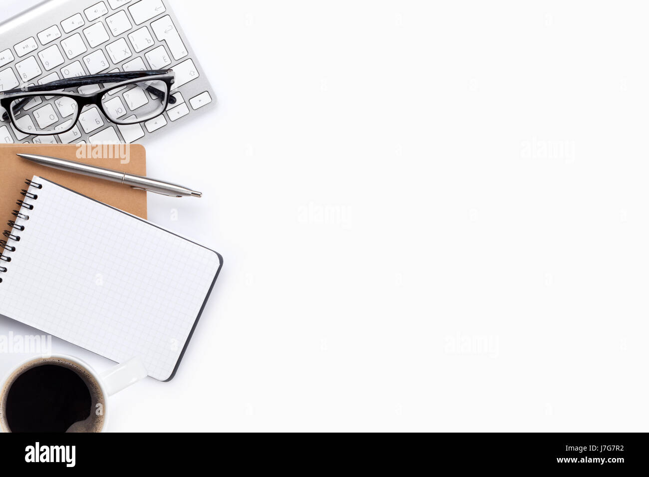 White office desk with computer and supplies. Tabletop. Top view with ...