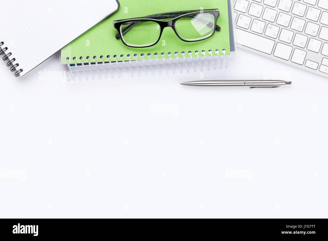 White office desk with computer and supplies. Tabletop. Top view with ...