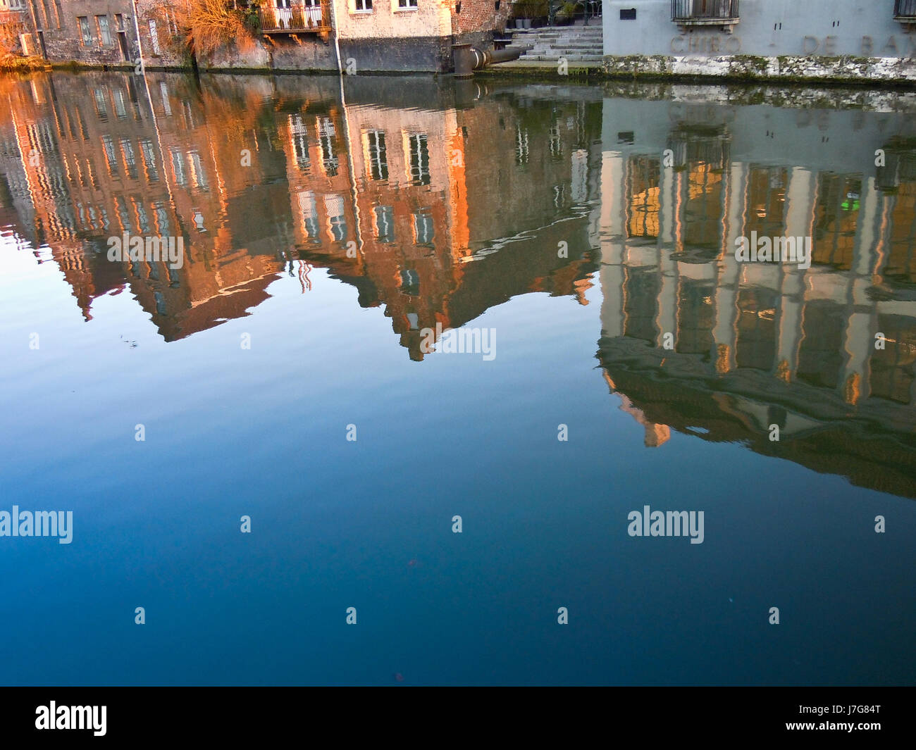 houses waters mirroring reflection building river water buildings city ...