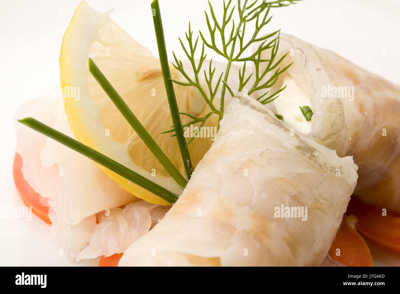 food aliment fish rolls table rollers wrappedwith tomato sea bass Stock ...