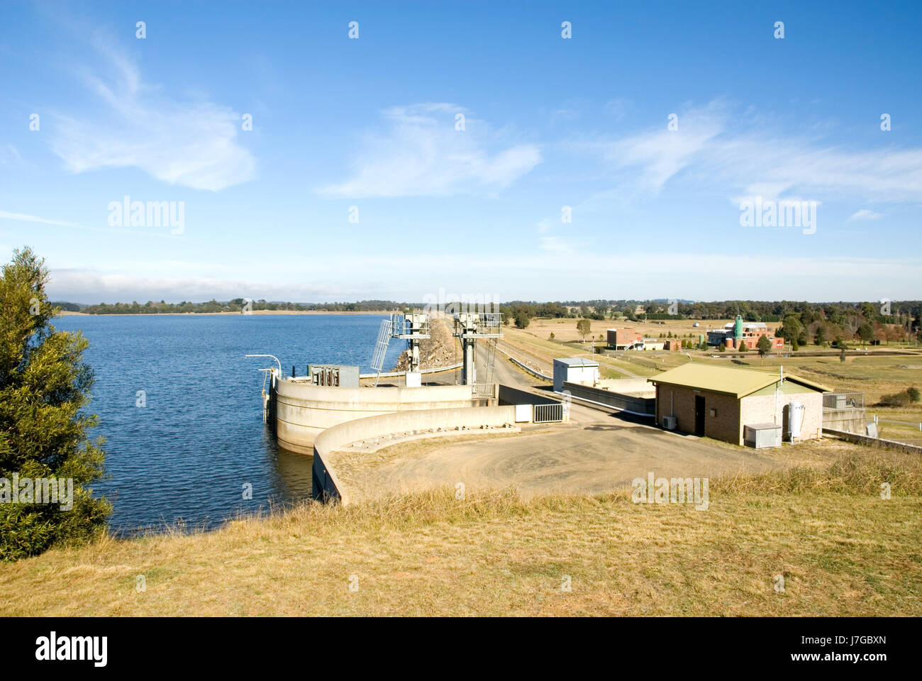 blue buildings tree trees australia concrete wall dam barrier ...