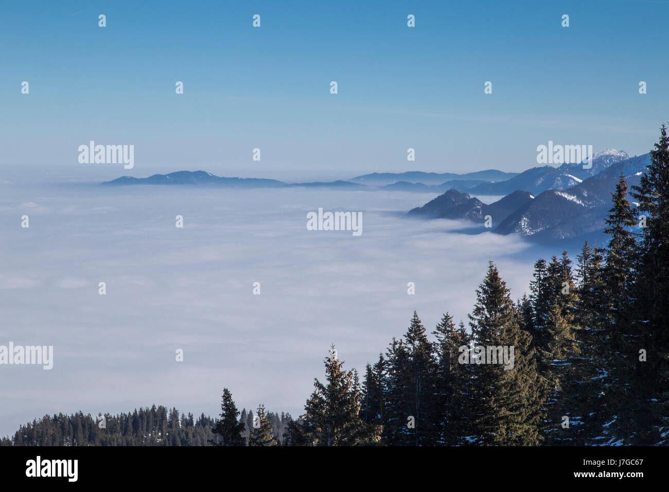Summit over cloud cover, view from the mountain station of the ...