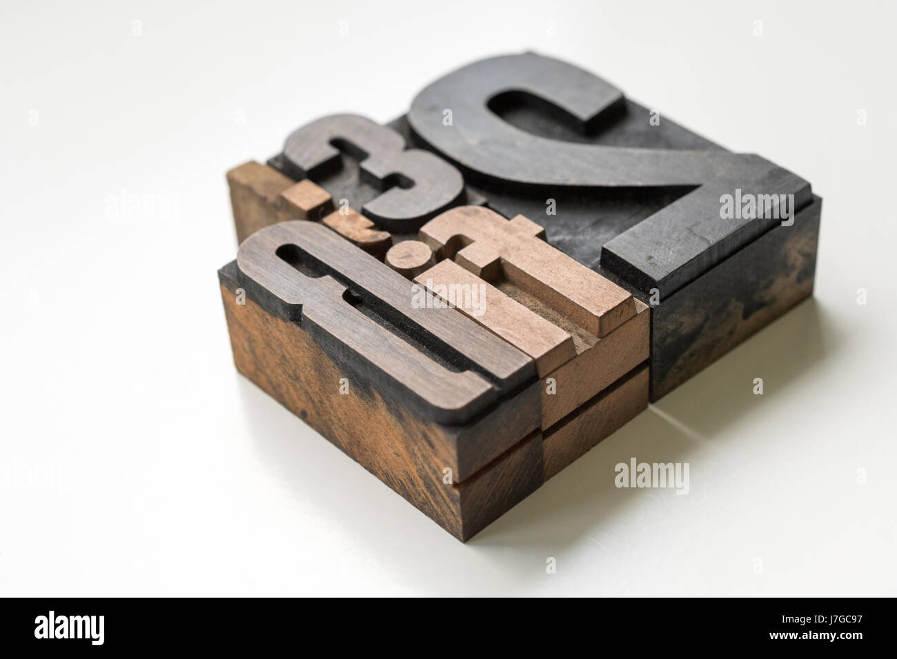 Old letterpress printing blocks isolated on a white background Stock ...