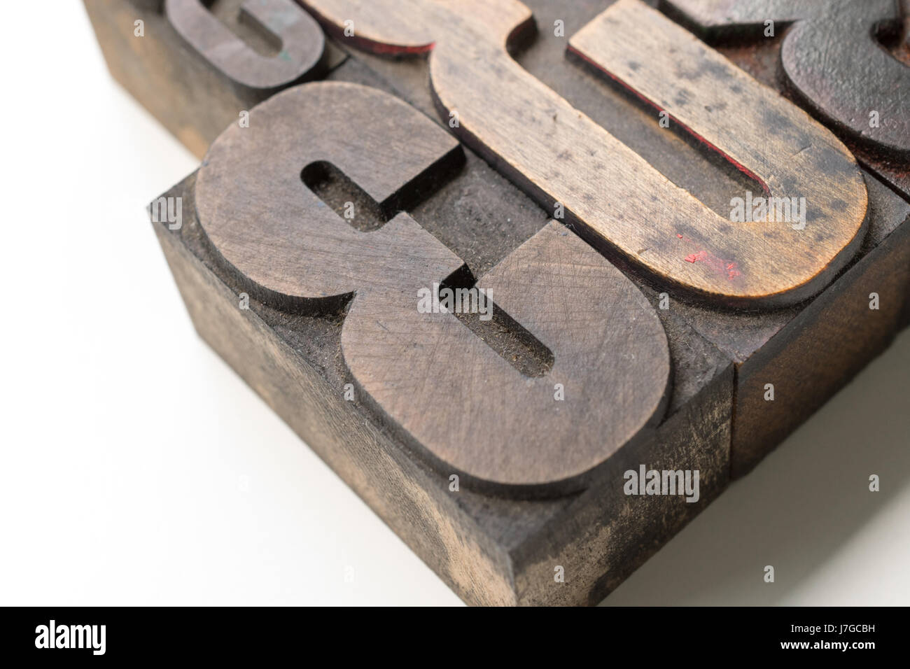 Old number three letterpress printing block isolated on a white ...