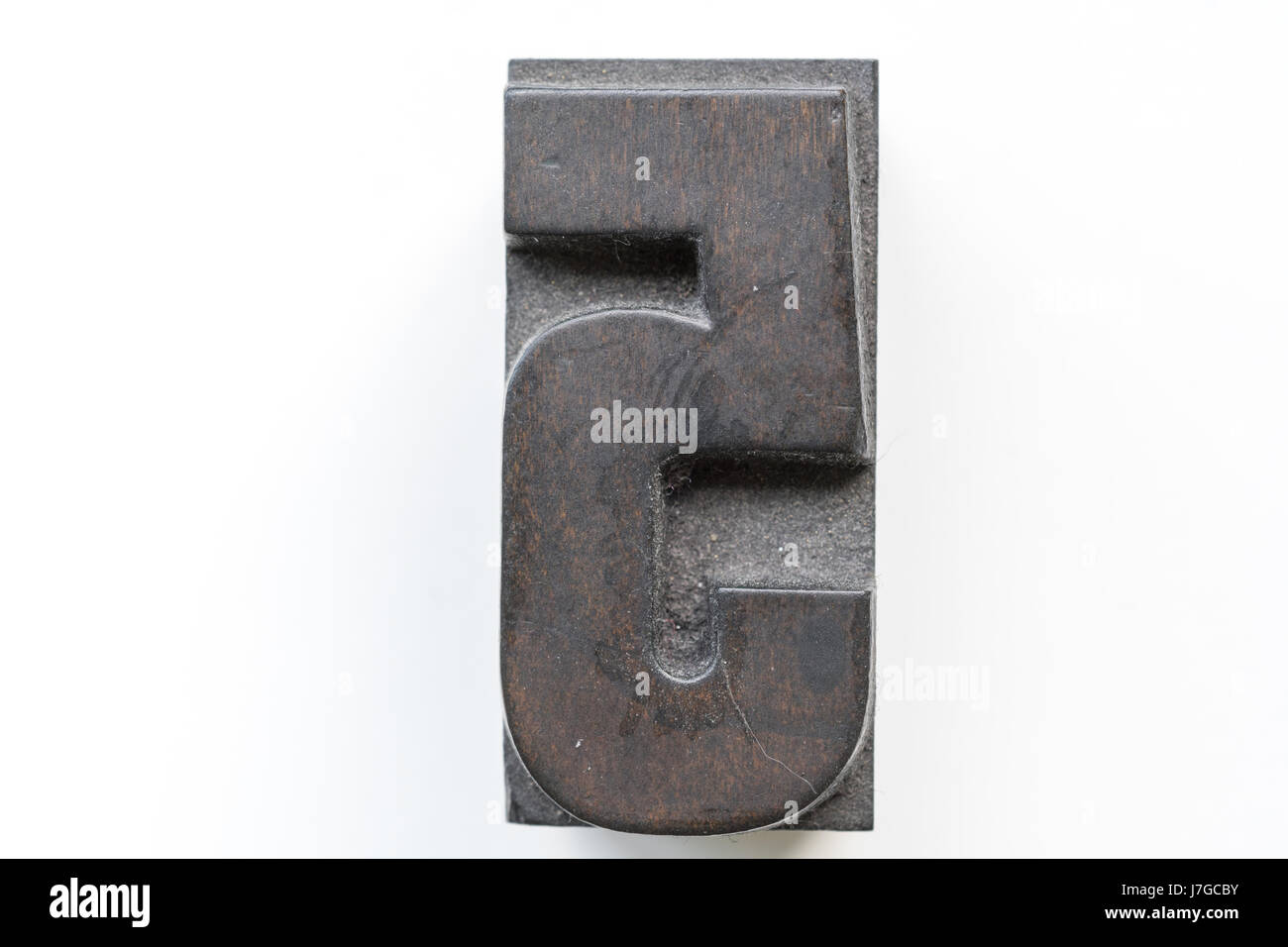 Old number five letterpress printing block isolated on a white ...