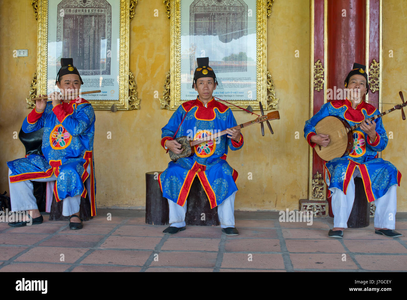 Vietnamese musicians in traditional robes of the court, Imperial Palace ...