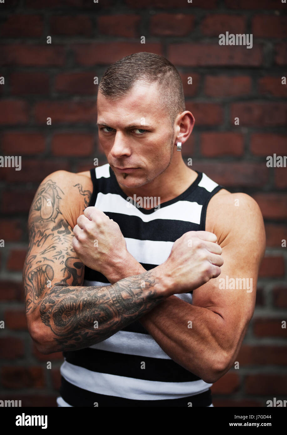 guy male masculine person muscles outdoor blurred stare serious gaze ...