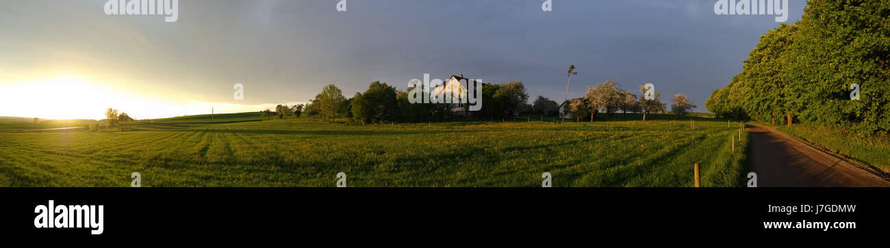 spring landscape with farm Stock Photo - Alamy