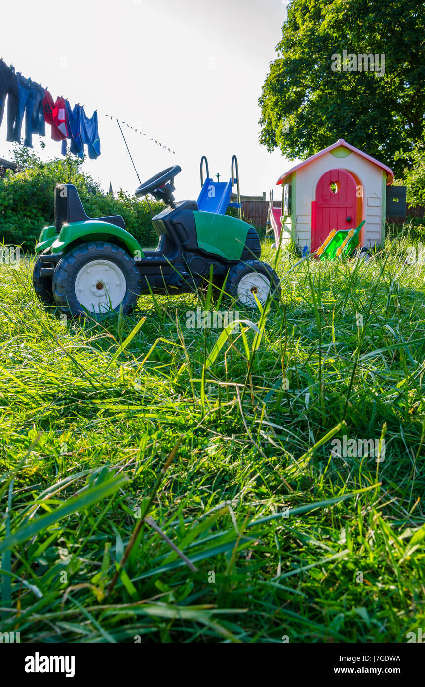 Toy tractor on grass hi-res stock photography and images - Alamy