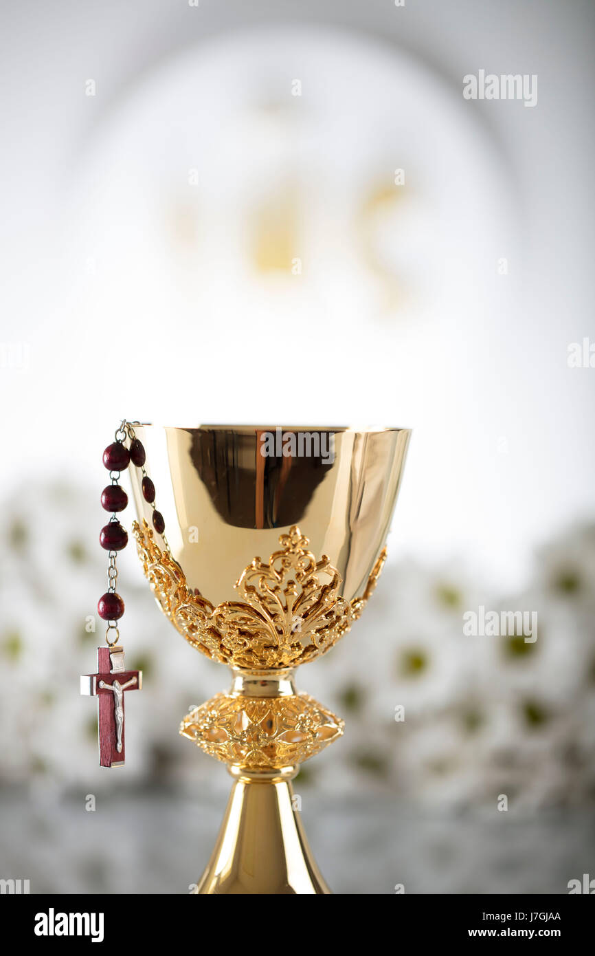 First Holy Communion. Catholic religion theme. Crucifix, Bible, bread ...