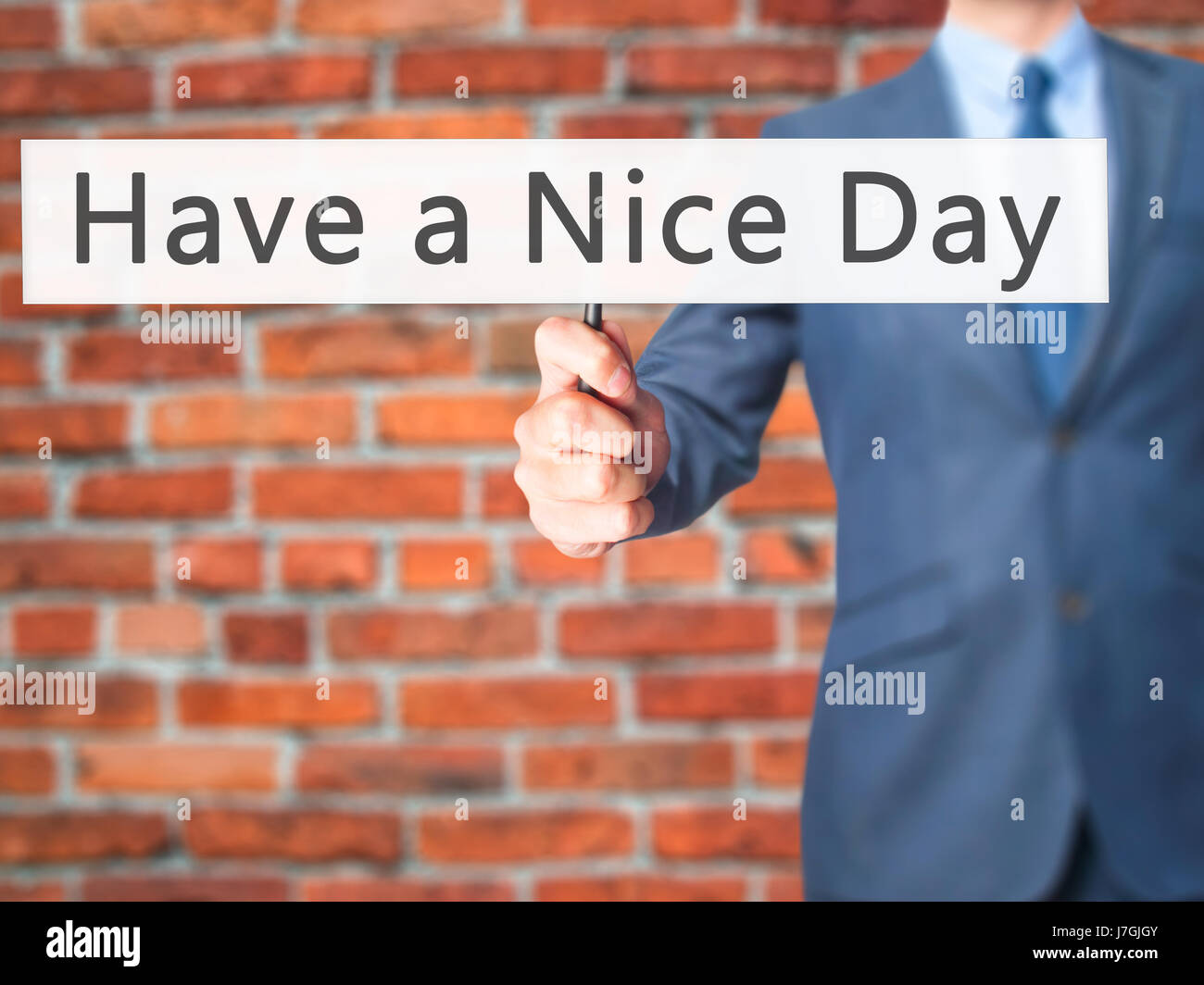 Have a Nice Day - Businessman hand holding sign. Business, technology ...