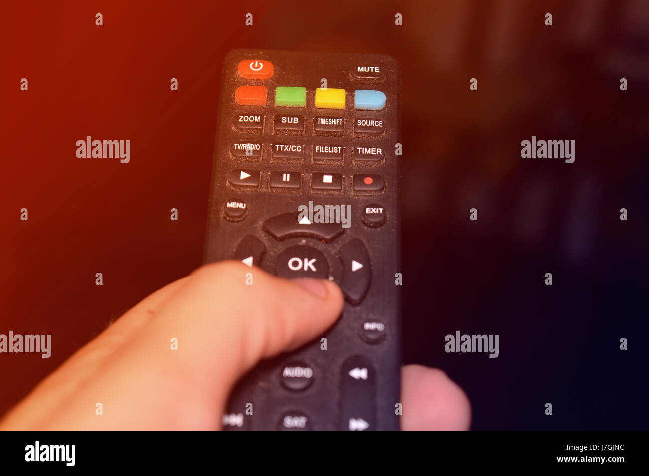 person uses remote control, closeup of hand with tv remote Stock Photo ...