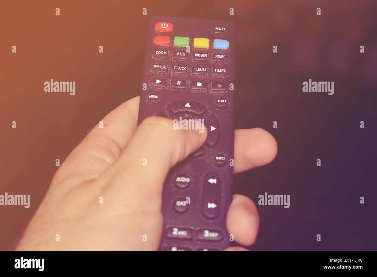 person uses remote control, closeup of hand with tv remote Stock Photo ...