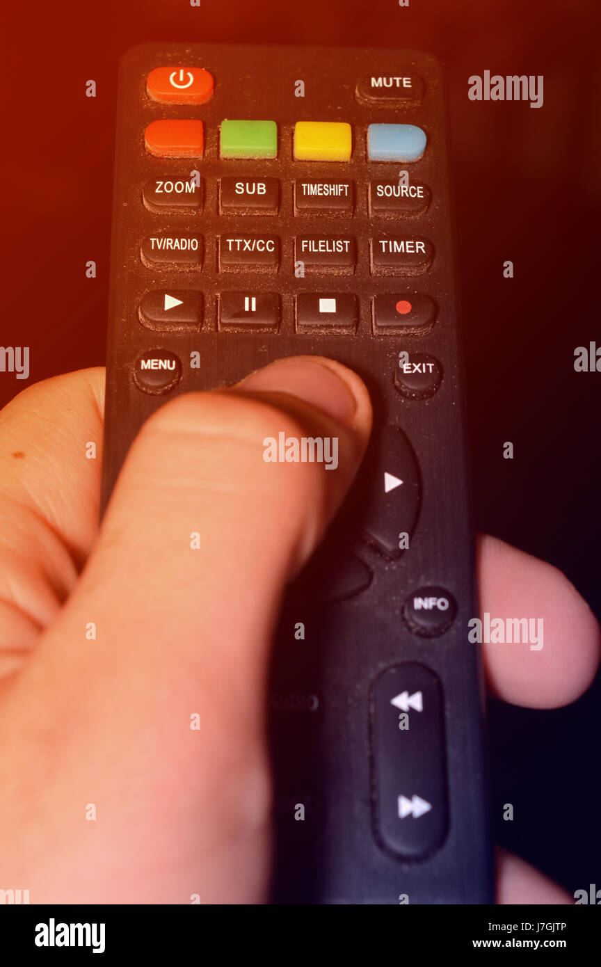person uses remote control, closeup of hand with tv remote Stock Photo ...