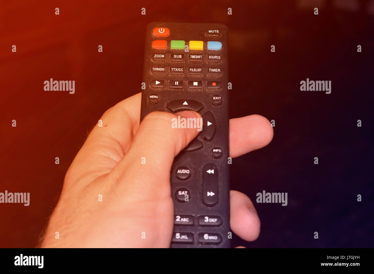 person uses remote control, closeup of hand with tv remote Stock Photo ...