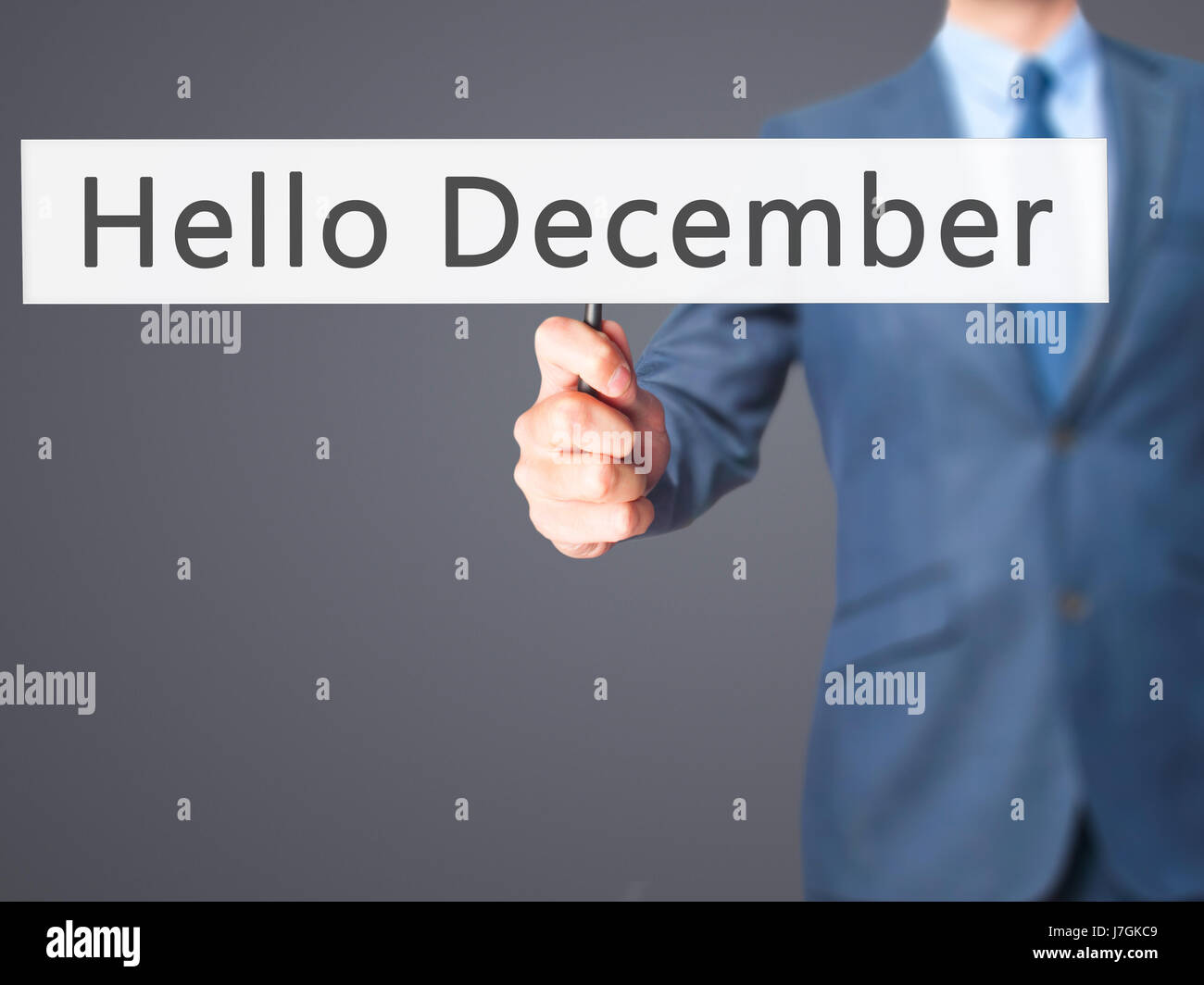Hello December - Businessman hand holding sign. Business, technology ...