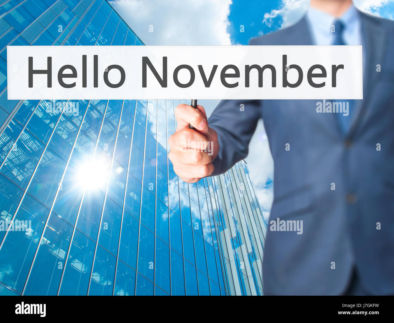 Hello November - Businessman hand holding sign. Business, technology ...