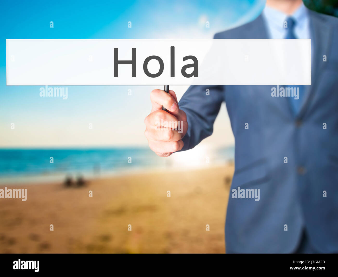 Hola - Businessman hand holding sign. Business, technology, internet ...