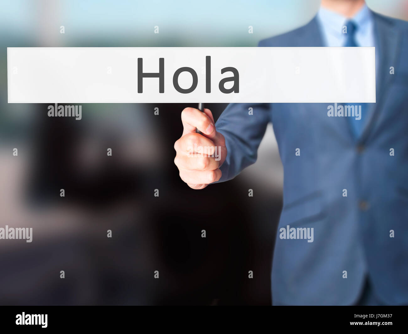 Hola - Businessman hand holding sign. Business, technology, internet ...