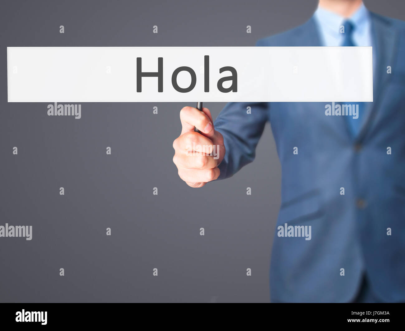 Hola - Businessman hand holding sign. Business, technology, internet ...
