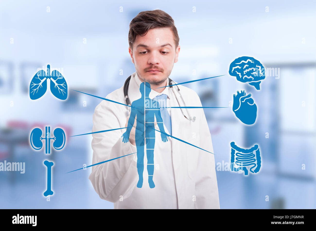 Handsome medic pressing modern medical interface with human body ...