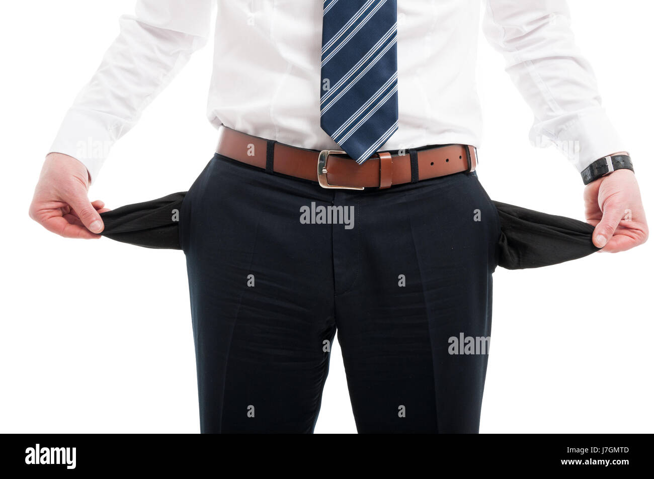 Close-up of elegant man showing his empty pockets wearing suit and tie ...