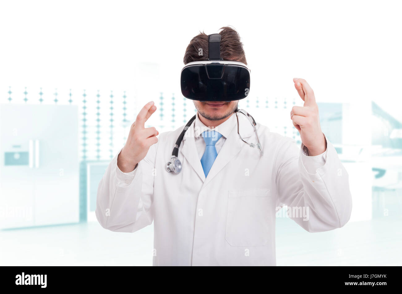 Happy doctor showing good luck sign with both hands as hope concept ...