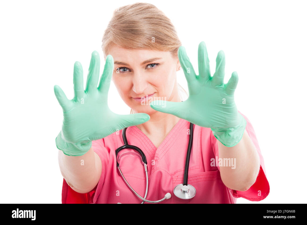 Lady medical nurse making scared gesture with hands isolated on white ...